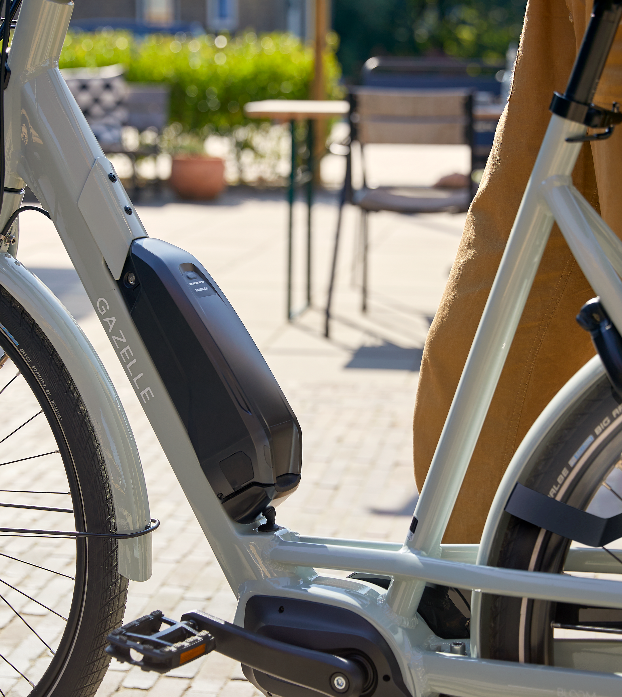 Electric bike with battery in frame store